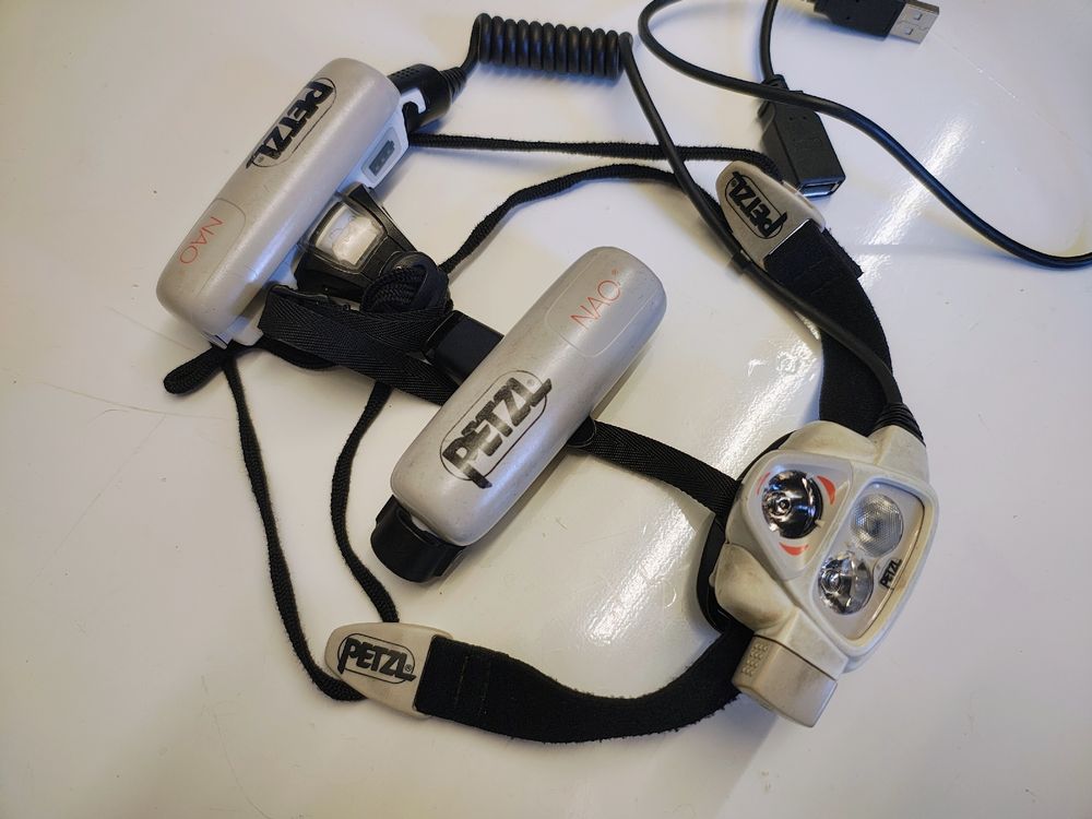 Petzl Nao Stirnlampe mit zwei Akkus (Gebraucht) in Birsfelden für CHF 2 ...