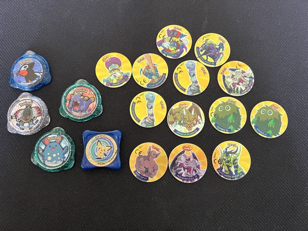 Lot de POGs Pokémon et Yu-Gi-Oh! (D'occasion) à Neuchâtel pour CHF 3 ...