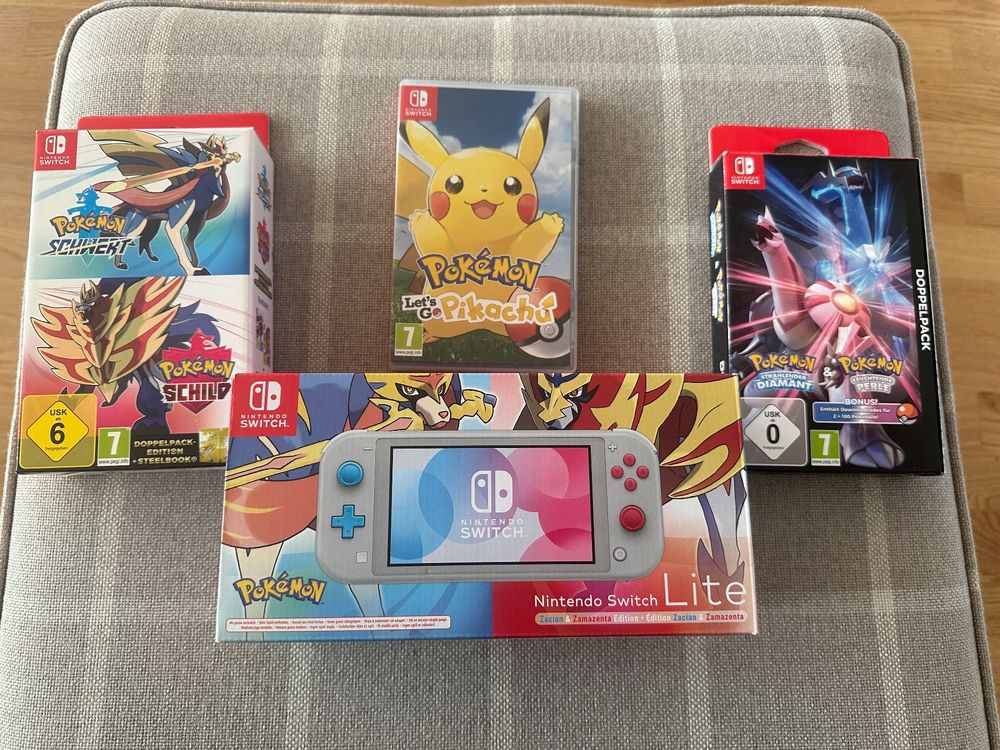 Nintendo Switch Lite Pokemon Edition + Games Neuwertig (Gebraucht) in ...
