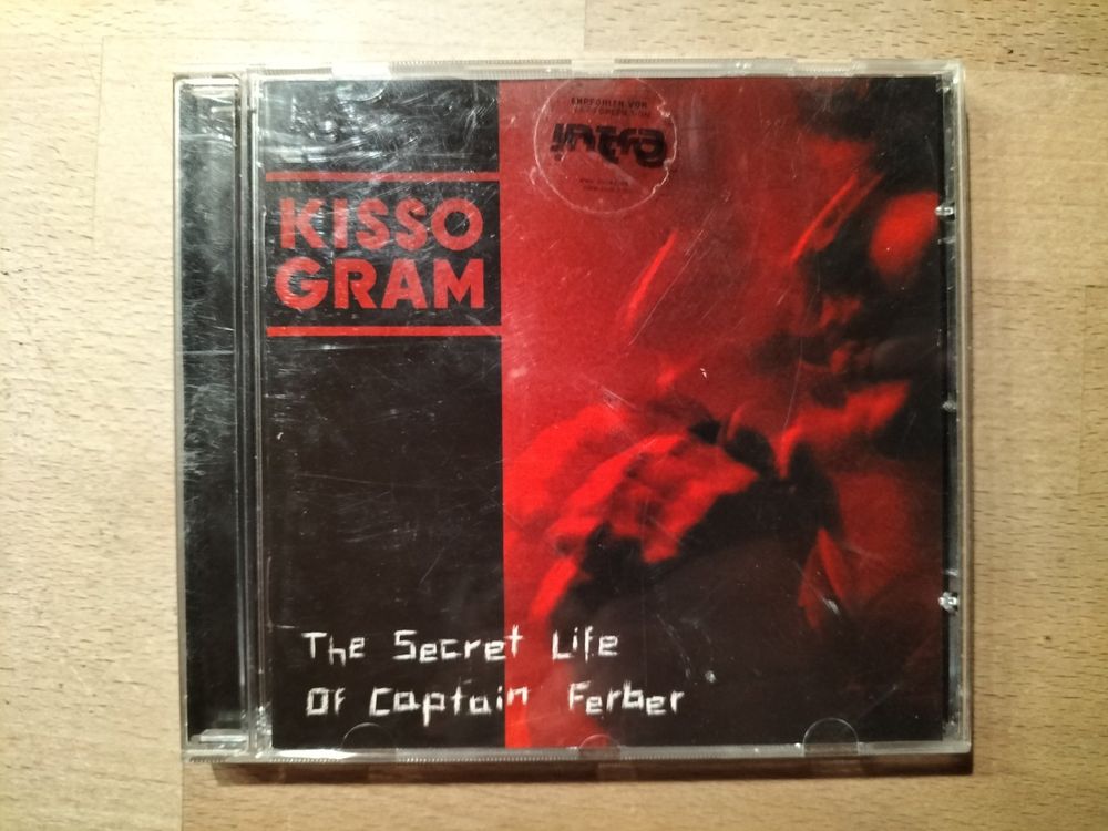 Kissogram – The Secret Life Of Captain Ferber | Kaufen auf Ricardo