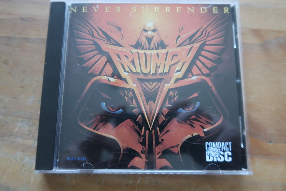 TRIUMPH - NEVER SURRENDER - MELODIC HARD ROCK CD (Gebraucht) in Basel für CHF 9 – mit Lieferung ...