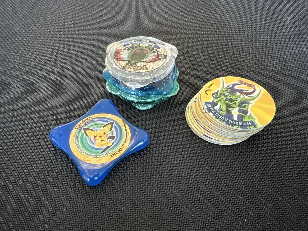 Lot de POGs Pokémon et Yu-Gi-Oh! (D'occasion) à Neuchâtel pour CHF 3 ...