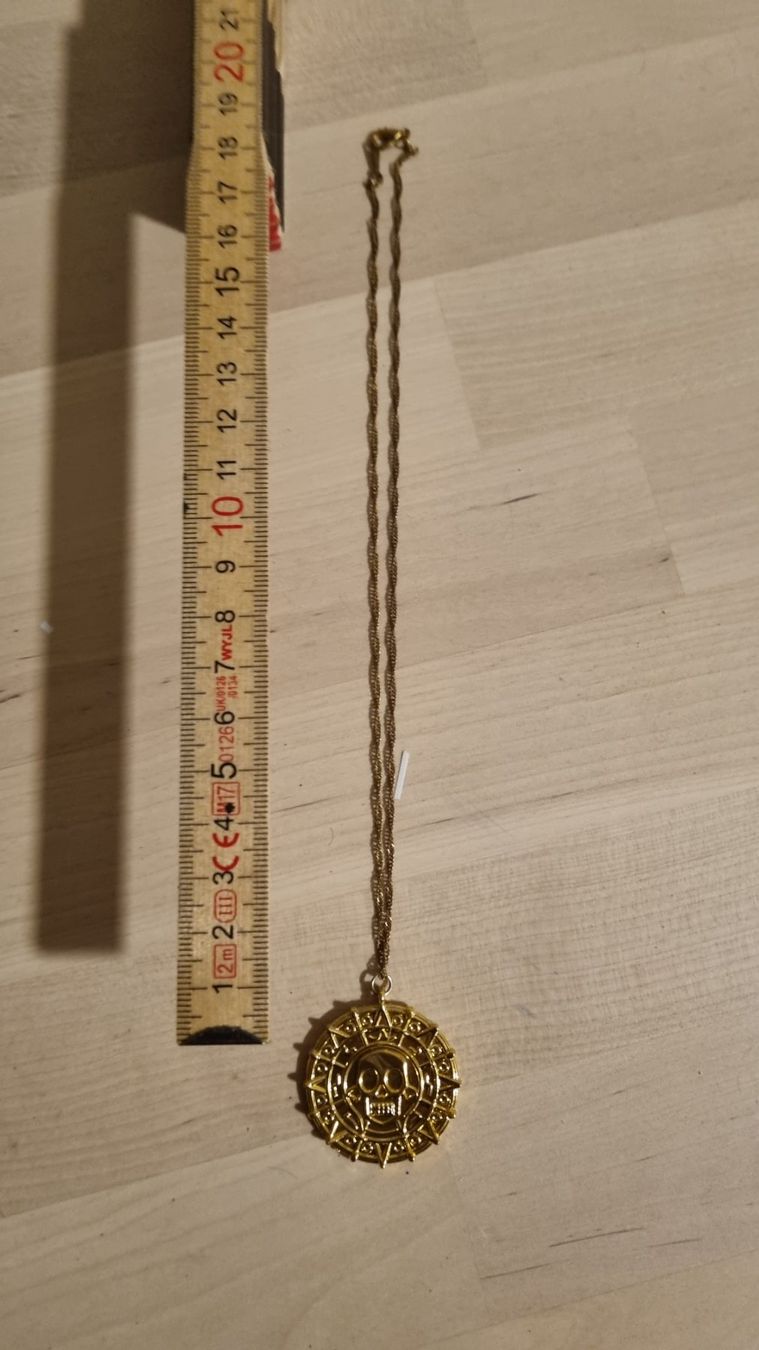 Collier "Pirates des Caraïbes" dorée (Neuf (Voir description)) à ...