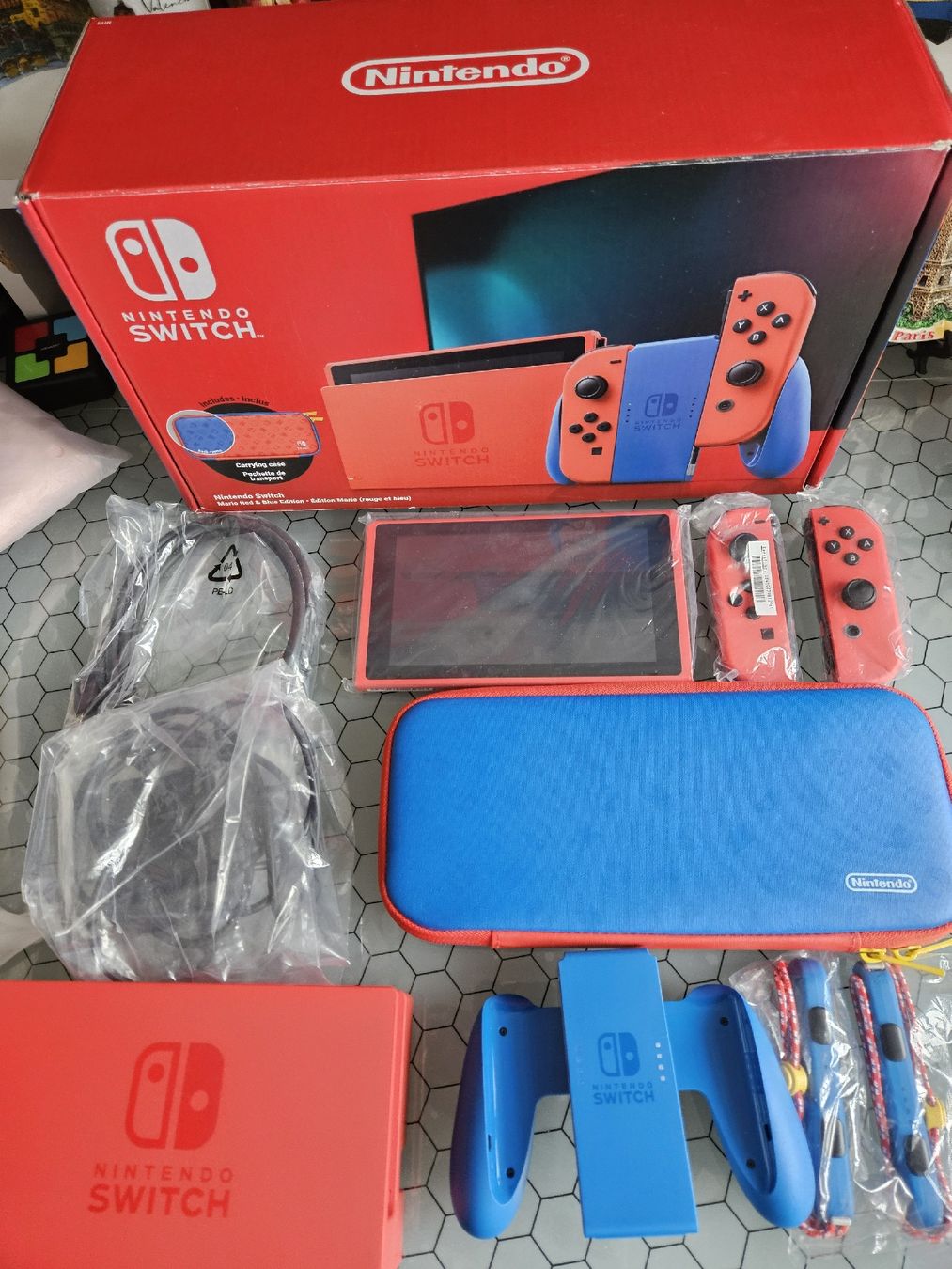 Nintendo Switch avec 3 jeux neuf dans sa boîte édition Mario (Neuf ...