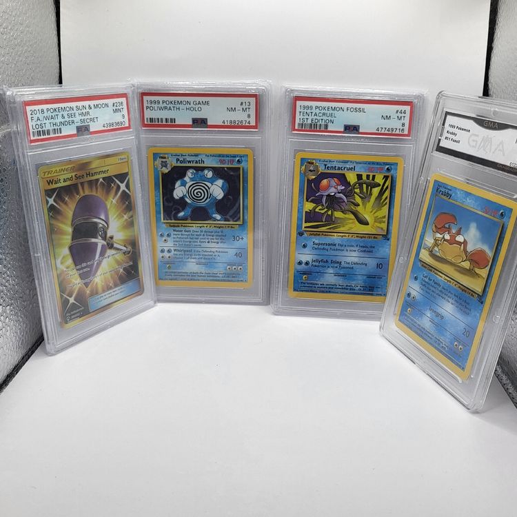 Slabs (PSA & 1 GMA) Loot. 1 first edition card (Neu und ...