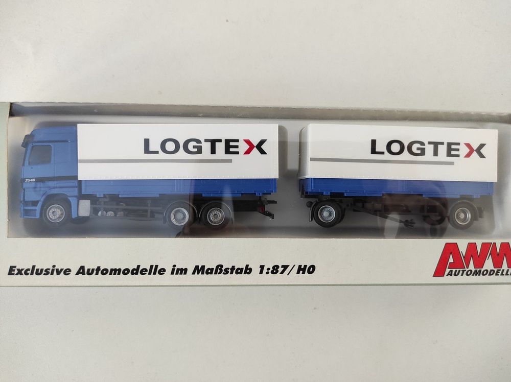 M-B Actros Hängerzug "LOGTEX" von AWM 1/87, Fabrikneu (Neu und originalverpackt) in La Chaux-de ...