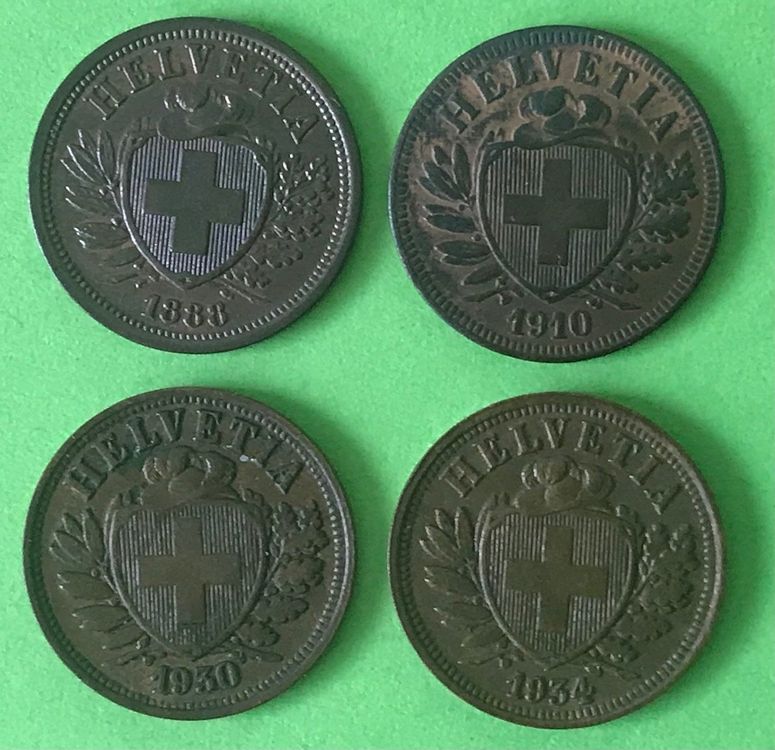4 Schweizer 2 Rappen-Münzen von 1888 / 1910 / 1930 / 1934 (Gebraucht) in Zürich für CHF 14 – mit ...