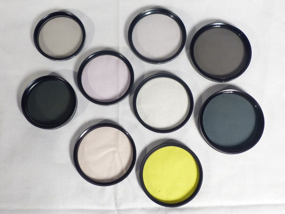 9 Filter und eine Nahlinse (Gebraucht) in Zürich für CHF 10 – mit ...