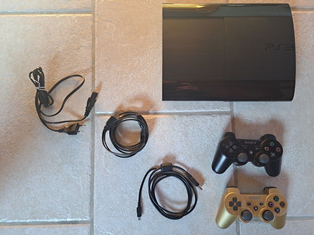 Playstation 3 + 2 Controller + 17 Spiele | Kaufen auf Ricardo