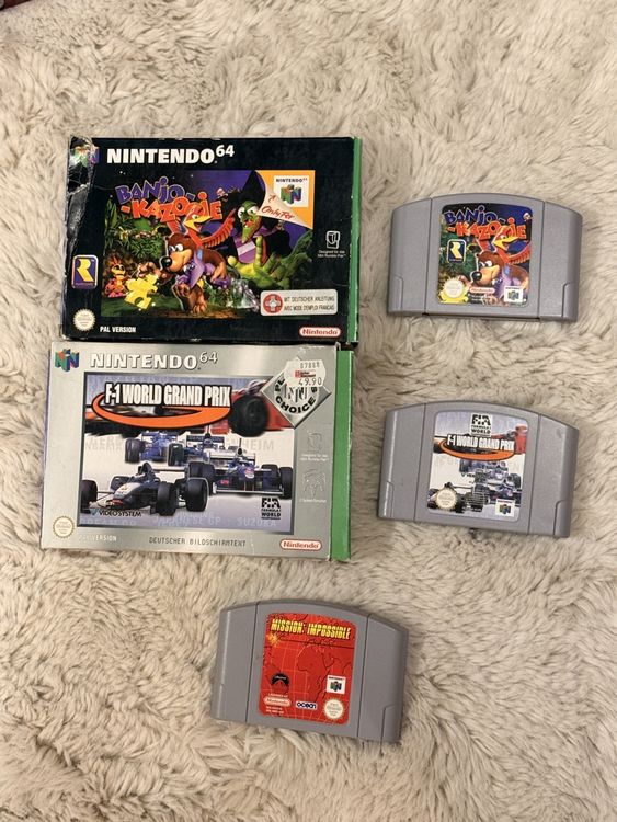 Nintendo 64 + 2 Controller + 3 Spiele + Adapter (Gebraucht) in Ftan für ...