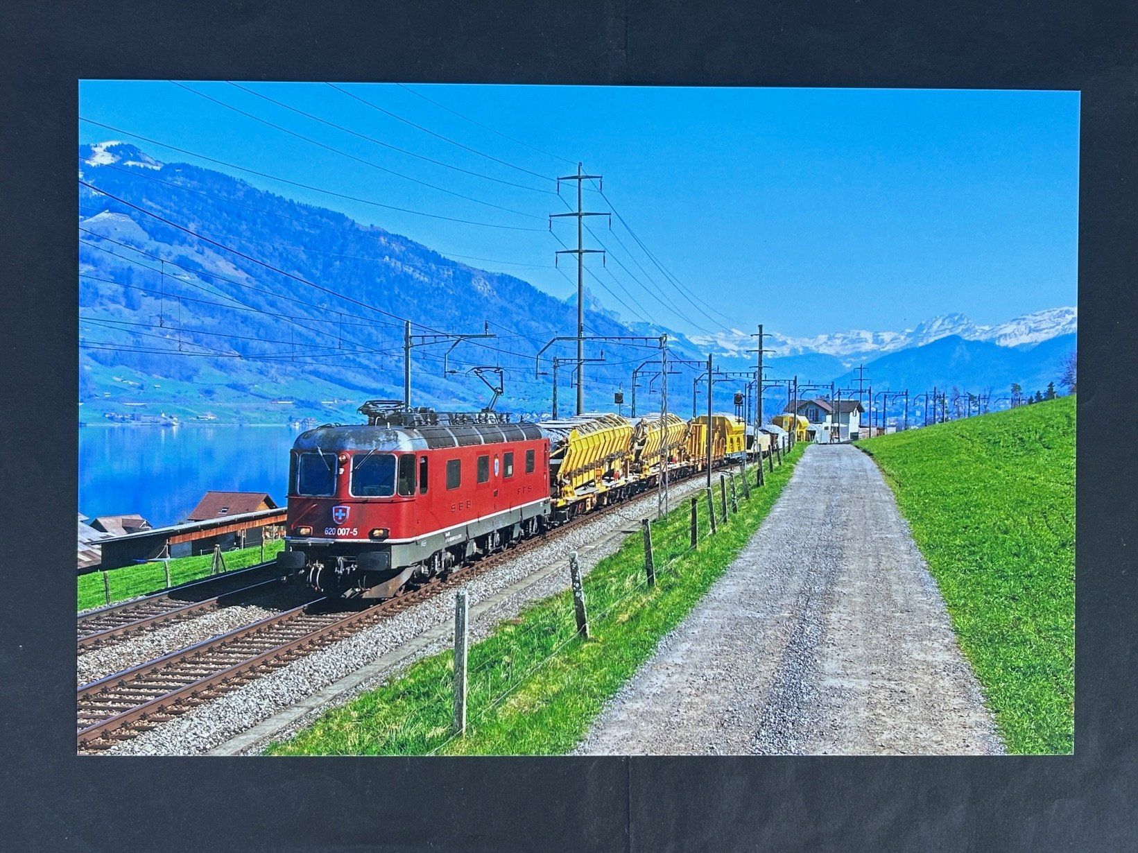 Re 6/6 11607 «Wattwil» mit Bauzug bei Immensee – 29.3.2019 (Neu (gemäss ...