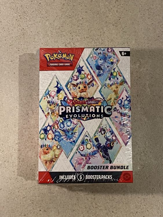 Pokémon Prismatic Evolutions Booster Bundle – 6 Packs – EN – (Neu und ...