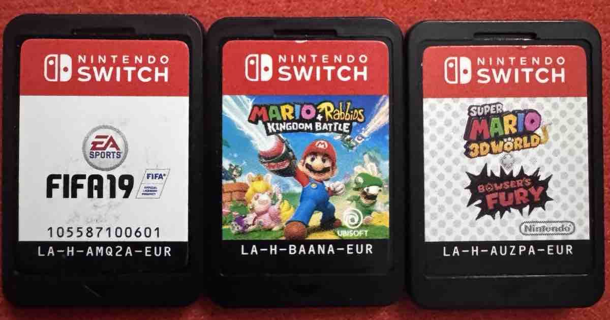 Console Nintendo Switch, noire, avec accessoires et jeux (Gebraucht) in ...