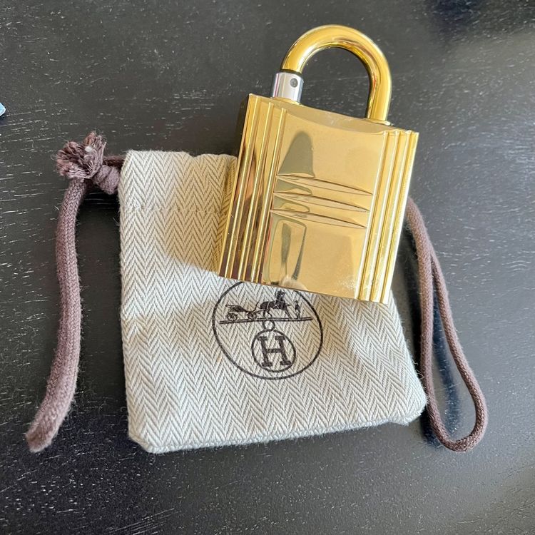 Hermès Kelly Lock Parfüm Flacon gold (Gebraucht) in Zürich für CHF 80 ...