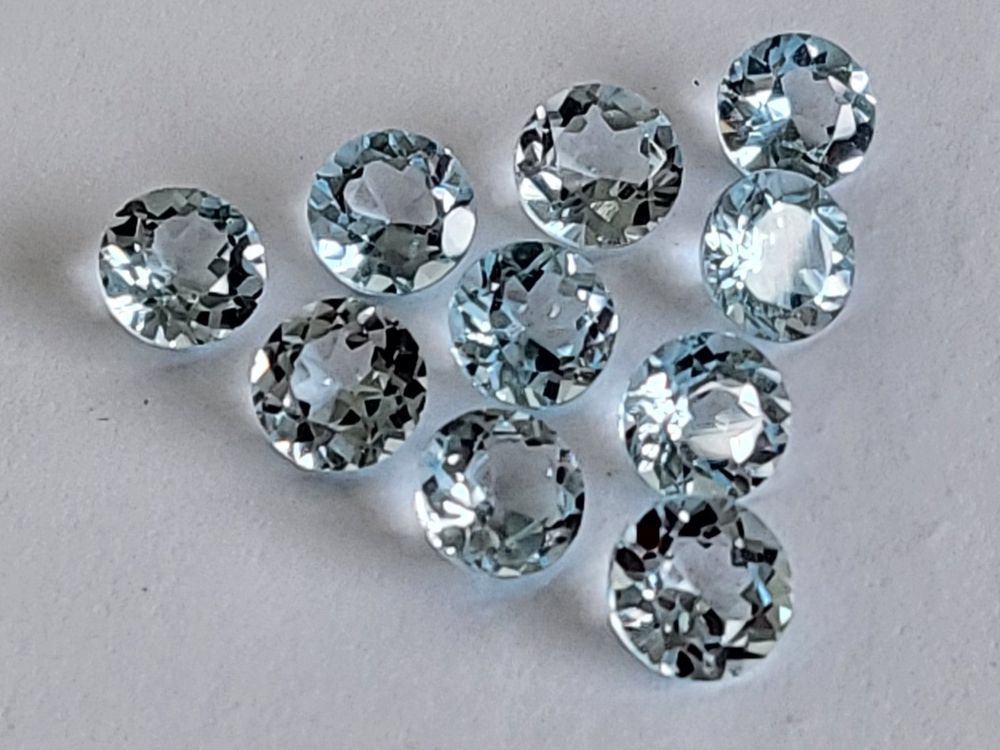 TOPAZE "Skye Blue" AAA ronde 6 mm / 1 ct (Neuf (Voir description)) à La ...