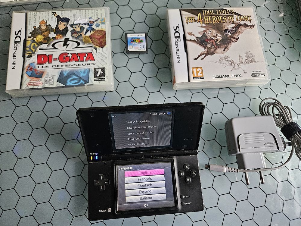 Nintendo DS i avec 3 jeux (D'occasion) à Genève pour CHF 169 – avec ...