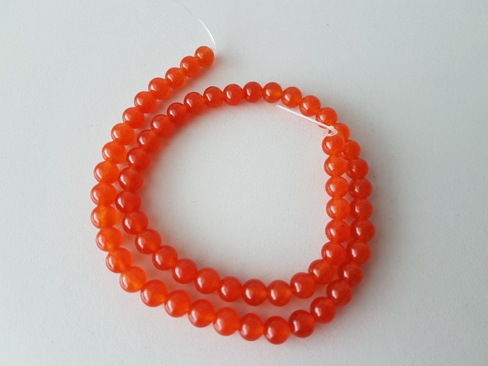 Ein Strang orange 6 mm Jade | Kaufen auf Ricardo