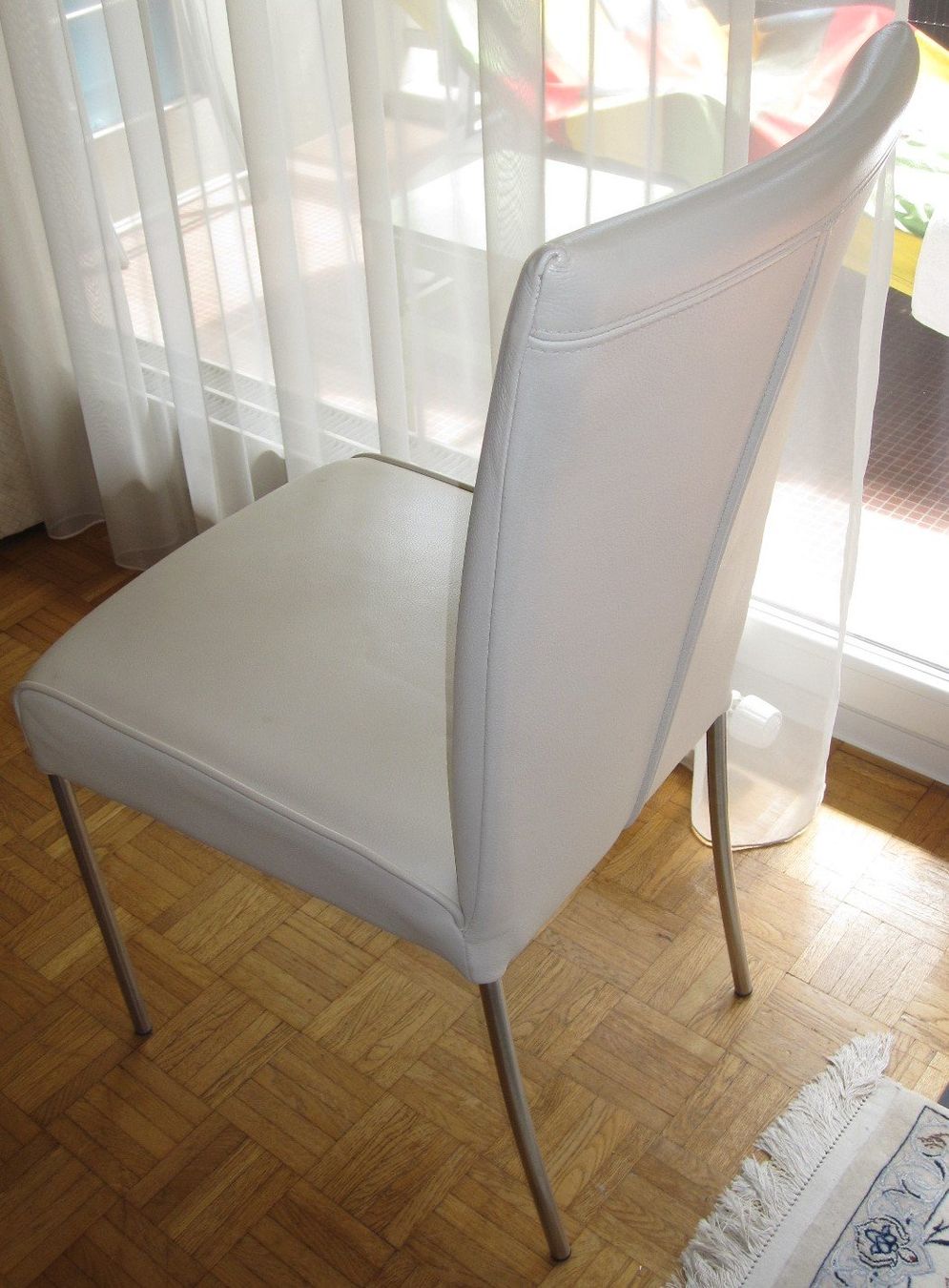 Chaises (x4) PFISTER, cuir Nubia blanc , support acier (D'occasion) à ...