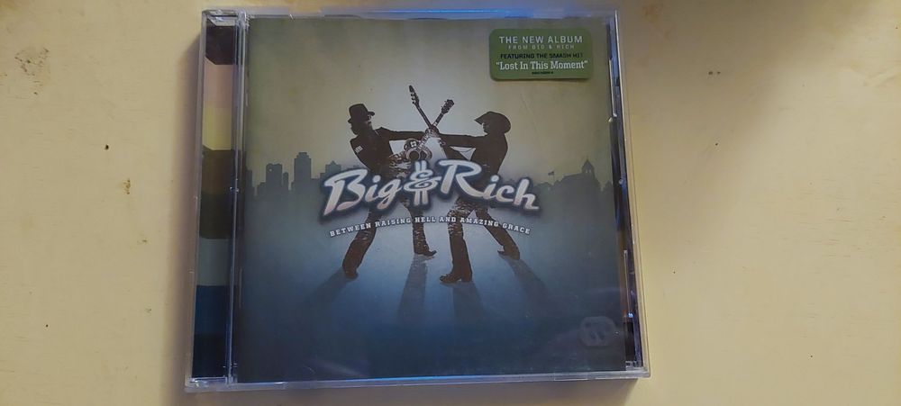 BIG RICH BETWEEN RAISING HELL AND AMAZING GRACE (Gebraucht) in Kallnach für CHF 2 – mit ...