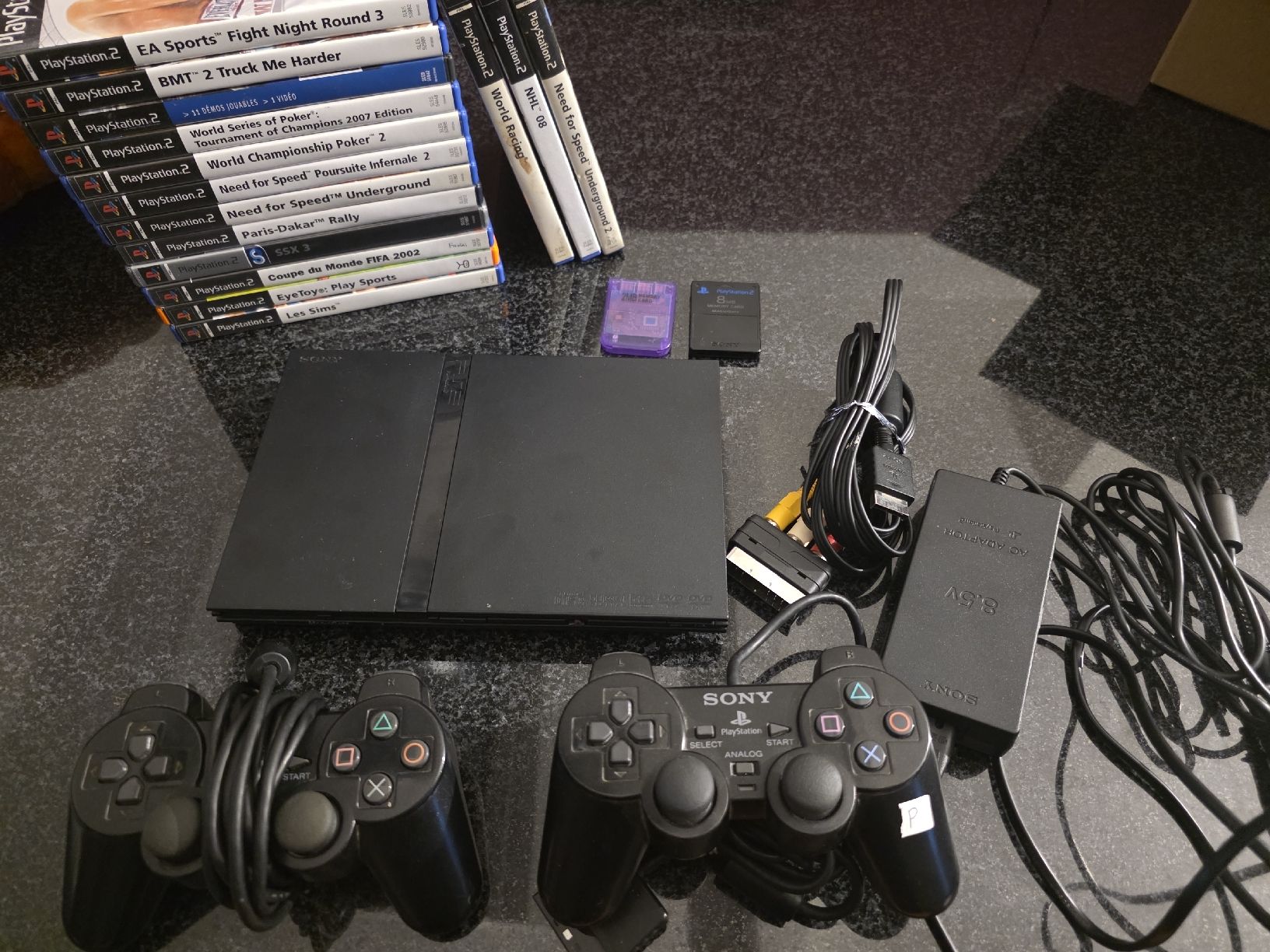 PS2 Slim avec 12 jeux (D'occasion) à Chavornay pour CHF 50 – avec ...
