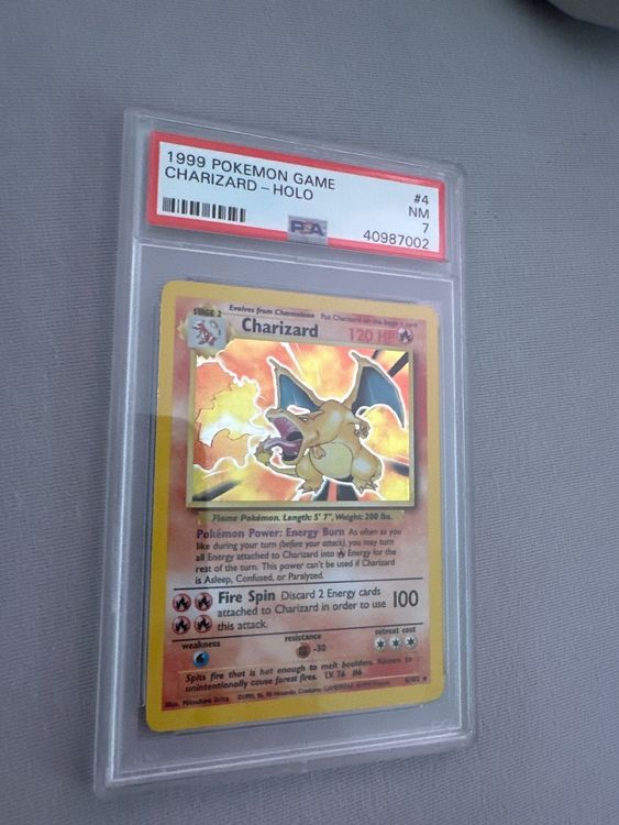 Charizard #4 - Pokemon Base Set: PSA 7 | Kaufen auf Ricardo
