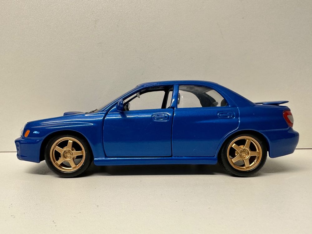 Subaru Impreza WRX (Bugeye) 1:24, blau, Bburago, inkl. OVP (Gebraucht) in Strengelbach für CHF ...