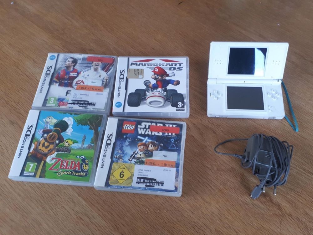 Nintendo DS Lite + 4 Spiele | Kaufen auf Ricardo