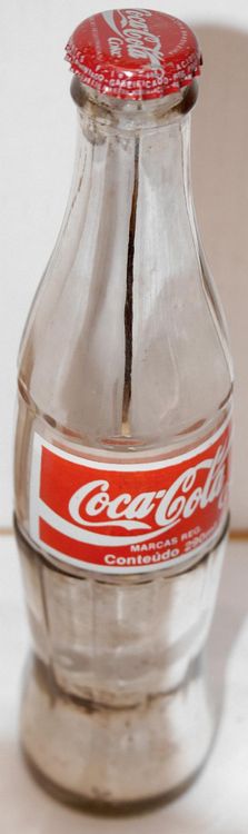silberfarbige Coca-Cola Flasche leer (02) | Kaufen auf Ricardo