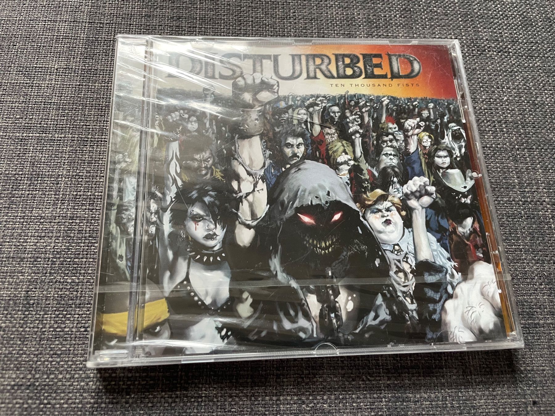DISTURBED: TEN THOUSANDS FISTS (CD) OVP! *METAL* (Neu und ...
