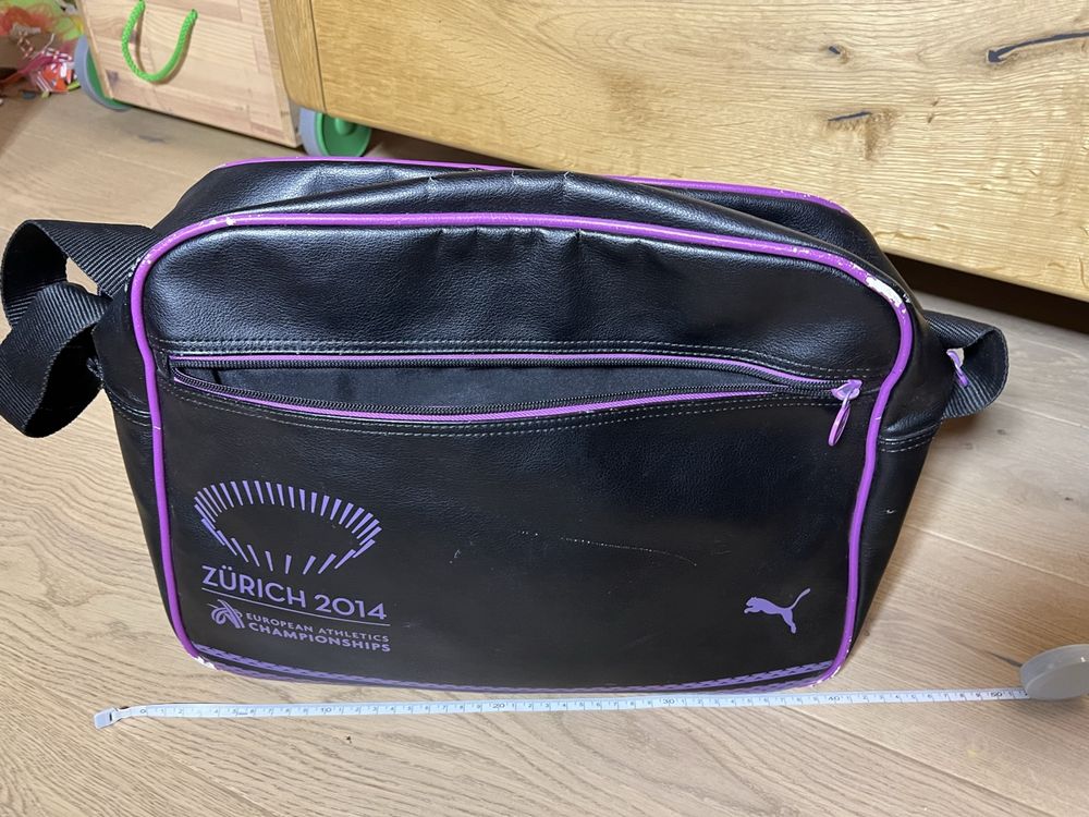 Puma Sporttasche Zürich 2014, schwarz/lila stark gebraucht (Defekt) in ...