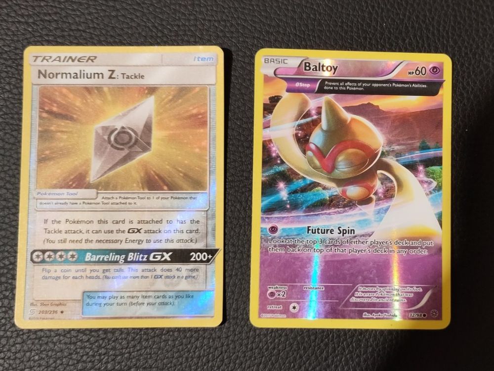 Zwei spezielle Pokémon Karten Normalium Z Baltoy | Kaufen auf Ricardo