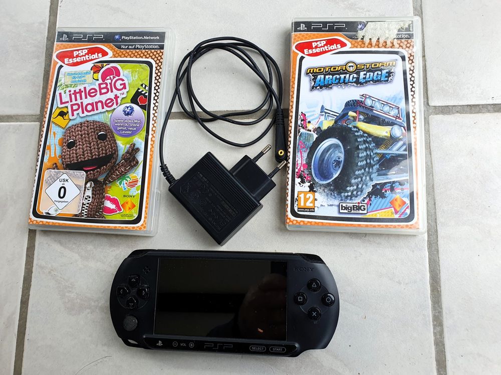 PSP - E 1004 2D Soni und 2 Spiele (Gebraucht) in für CHF 75 – mit ...