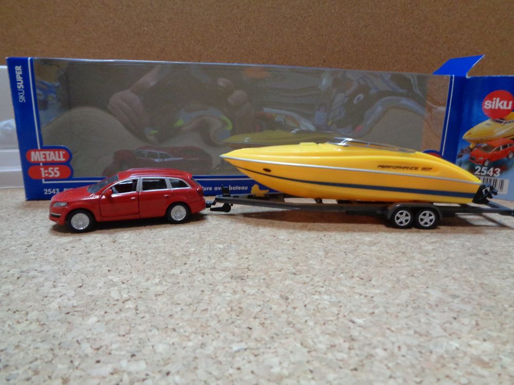 SIKU 2543 Audi Q 7 mit Anhänger und Speed-Boot OVP (Neu und originalverpackt) in Läufelfingen ...