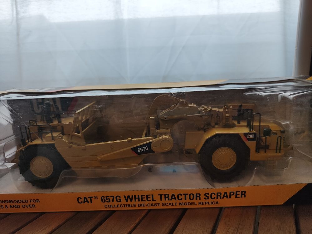 Metall Modell CAT 657G Wheel Tractor Scraper | Kaufen auf Ricardo