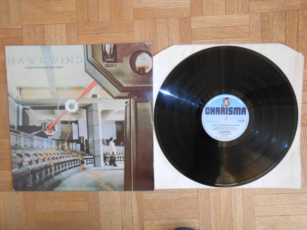 Hawkwind 1977 Strangeness and charm (LP Reissue) (Gebraucht) in ...