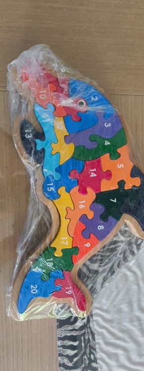 Wooden Dolphin Number Puzzle (Gebraucht) in Zürich für CHF 1 – mit ...