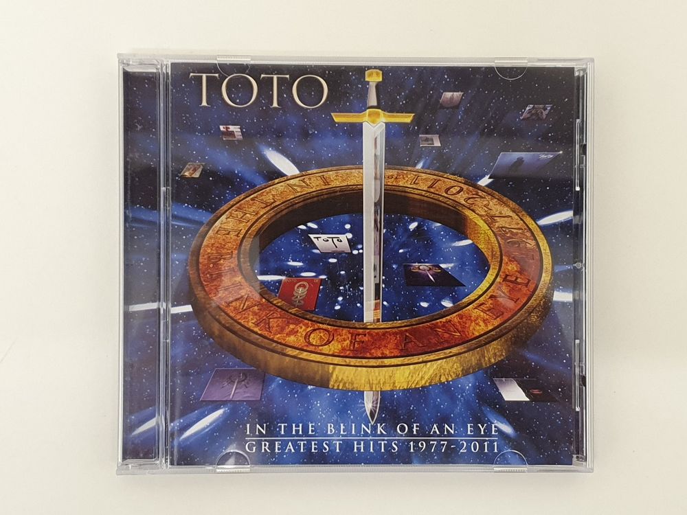 Toto - In The Blink Of An Eye, Greatest Hits 1977-2011 (CD) | Kaufen ...