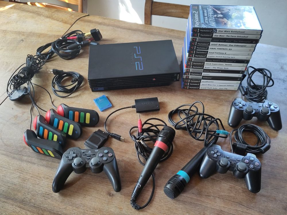 Playstation 2 mit 16 Spielen und viel Zubehör | Kaufen auf Ricardo
