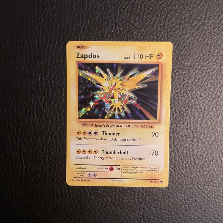 XY Evolutions - Zapdos Holo 42/108 NM- M | Kaufen auf Ricardo