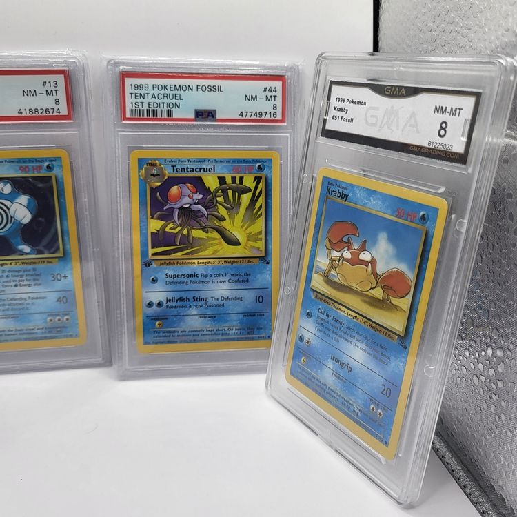 Slabs (PSA & 1 GMA) Loot. 1 first edition card (Neu und ...