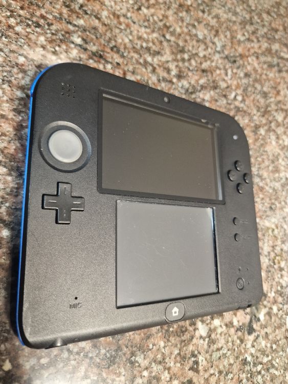Console Nintendo 2DS + chargeur + stylet (52 characters) | Kaufen auf ...