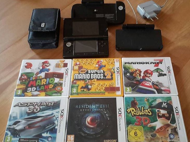 Nintendo 3DS + 6 Spiele + Resi Controller | Kaufen auf Ricardo