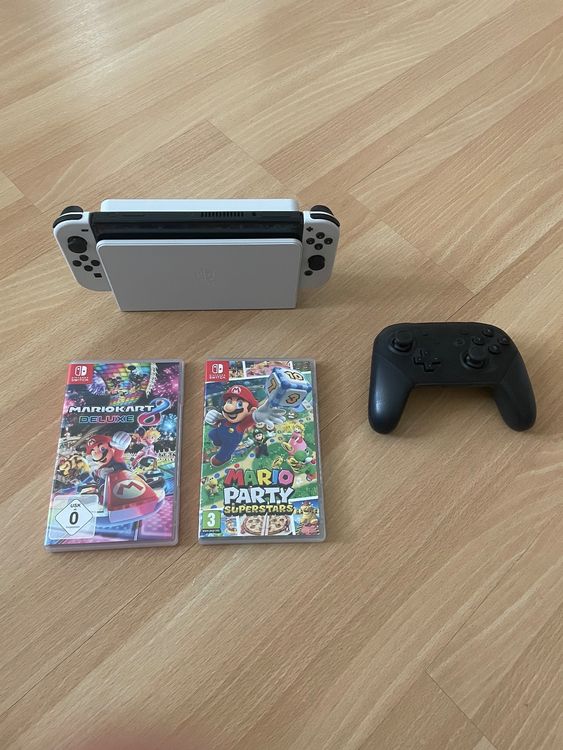 Nintendo Switch Oled + Pro Controller + 2 Games (Neu (gemäss Beschreibung)) in Baden für CHF 332 ...