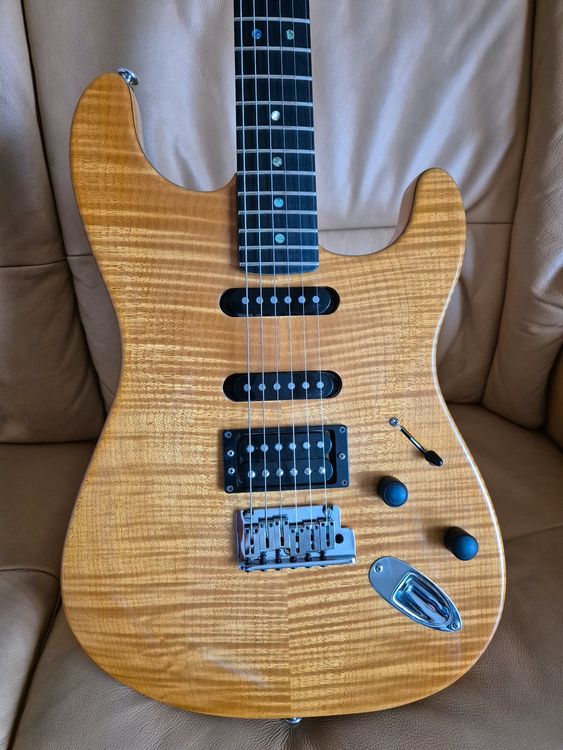 Fender American Deluxe Strat HSS RW FMT Amber + Koffer | Kaufen auf Ricardo