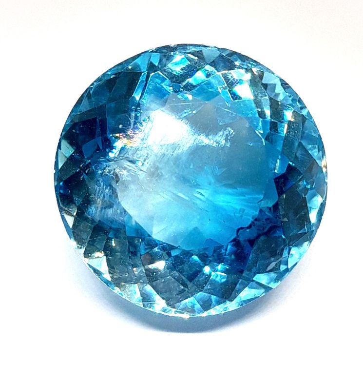 1x Topaze ronde 16 mm - 23.21 ct - Valeur estimée 250.- Fr (Neu (gemäss ...