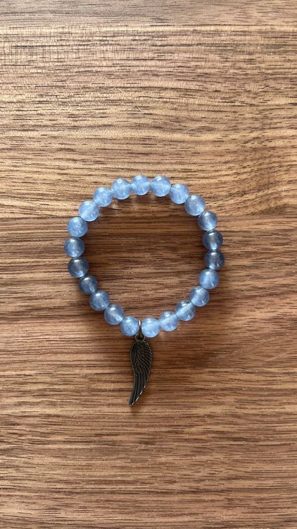Bracelet Manidou perles gris transparent avec grigri aile (Neuf (Voir ...