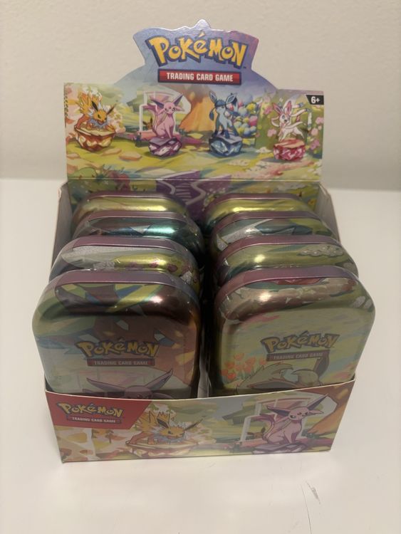 Pokemon Prismatic Evolutions 8x Mini Tin Display (Neuf avec emballage d ...