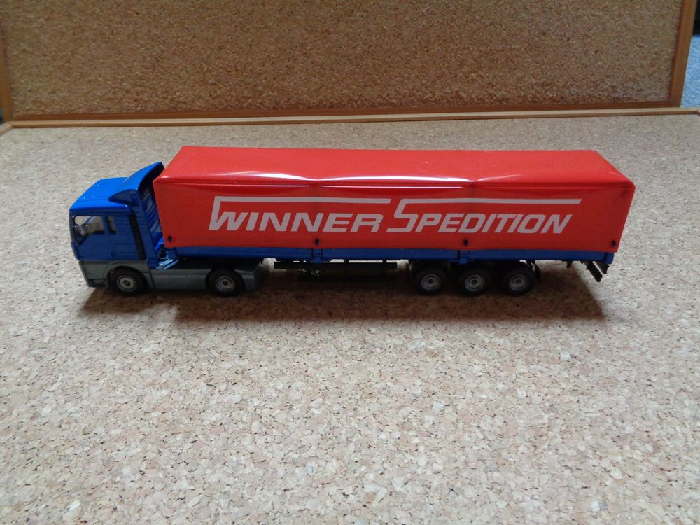 SIKU 3815 MAN TGA Planensattelzug 'Winner Spedition' | Acheter sur Ricardo