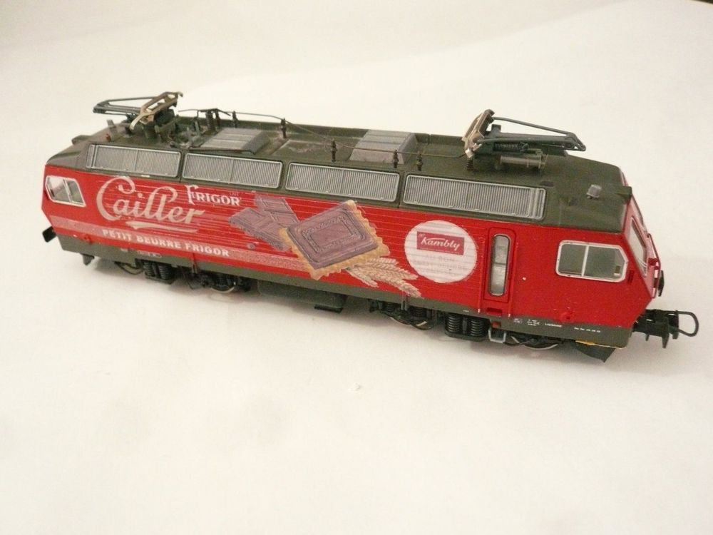 ROCO H0 RE 4/4 IV IN CAILLER PETIT BEURRE FRIGOR LACKIERT DC (Neu und originalverpackt) in ...