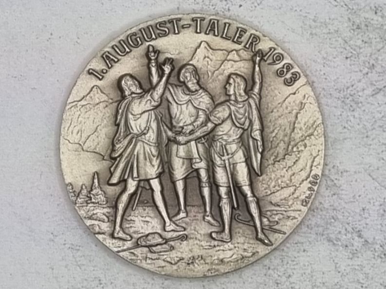 1.August Taler 1983 Tell's Sprung (Neu und originalverpackt) in Bure für CHF 16.05 – mit ...